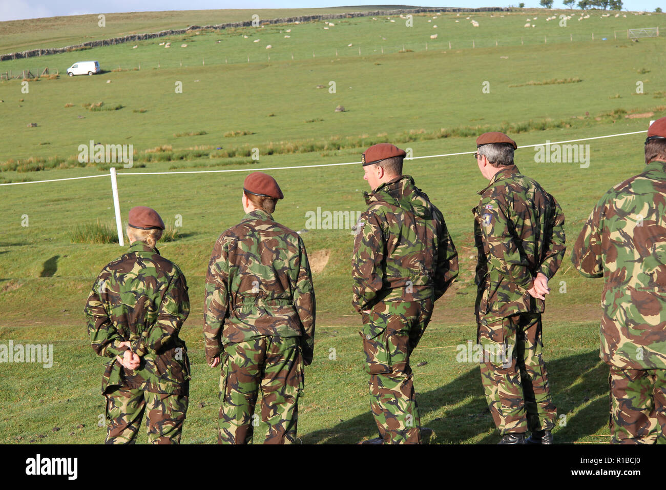 Army soldiers look on at the start of the Ten Tors on Dartmoor Stock ...