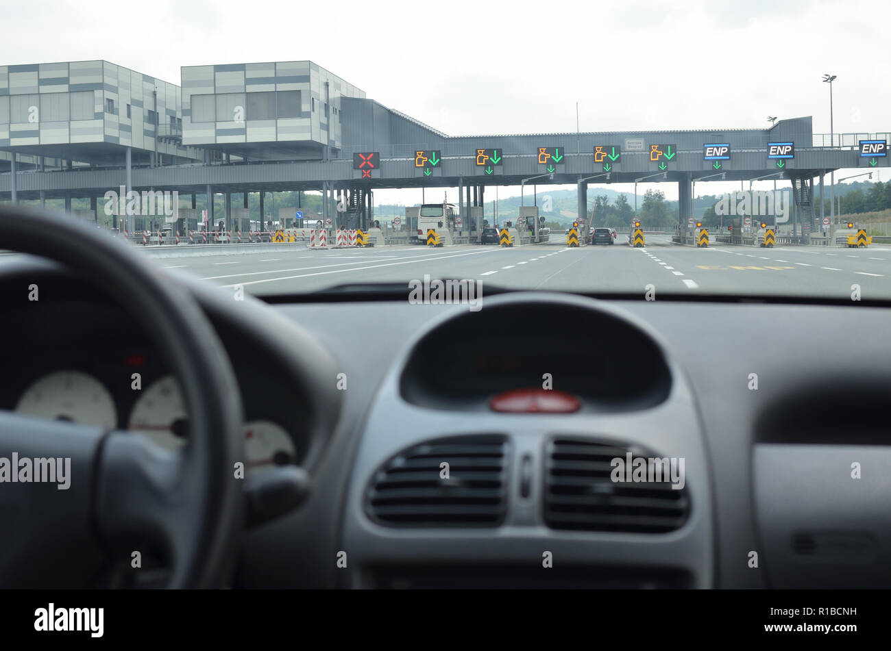 Driving a car on a highway and approaching to a pay toll Stock Photo ...