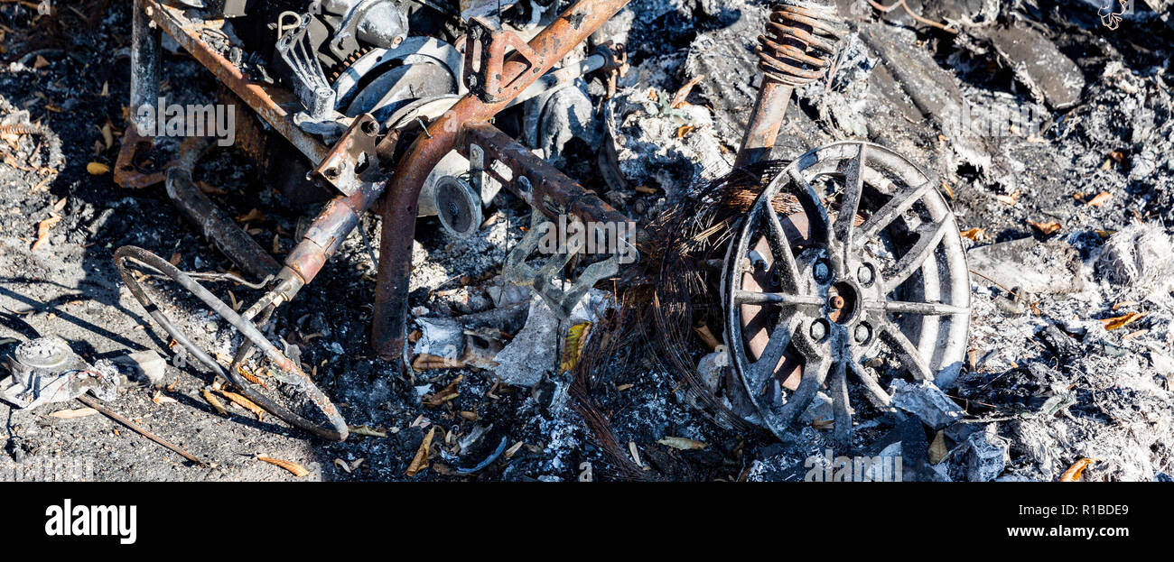 damaged burnt car metallic after arson fire with burnt debris after ...