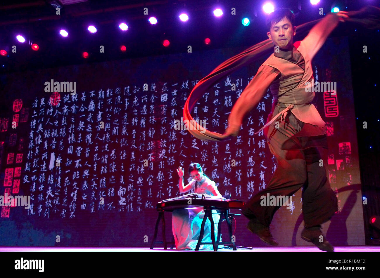 Shanghai, China. 11th Nov, 2018. Dancer Huang Doudou (front) performs ...