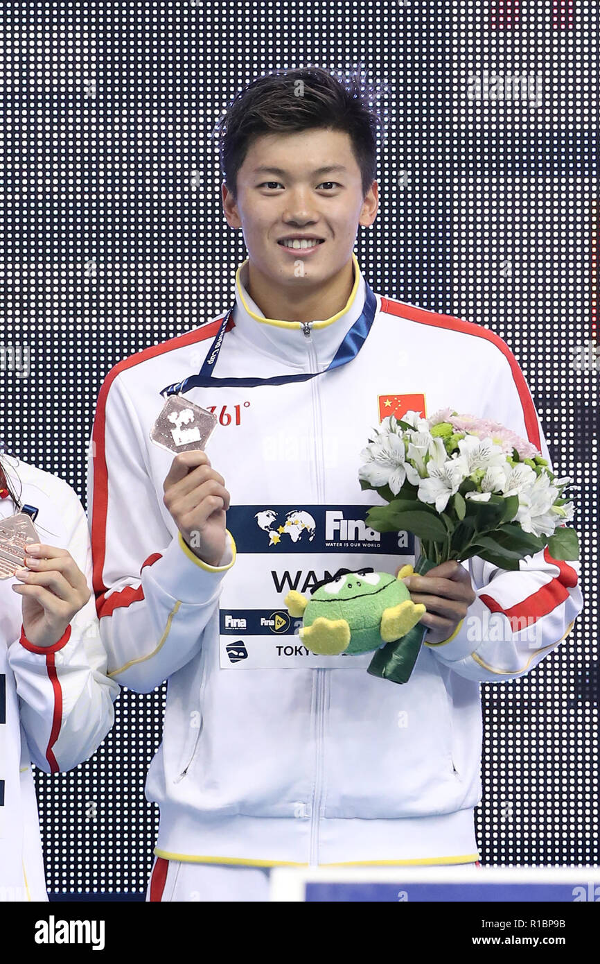 Tokyo. 11th Nov, 2018. China's Wang Shun poses on the podium during the ...