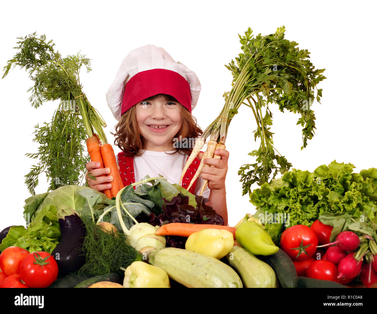 little girl cook with healthy vegetables Stock Photo - Alamy