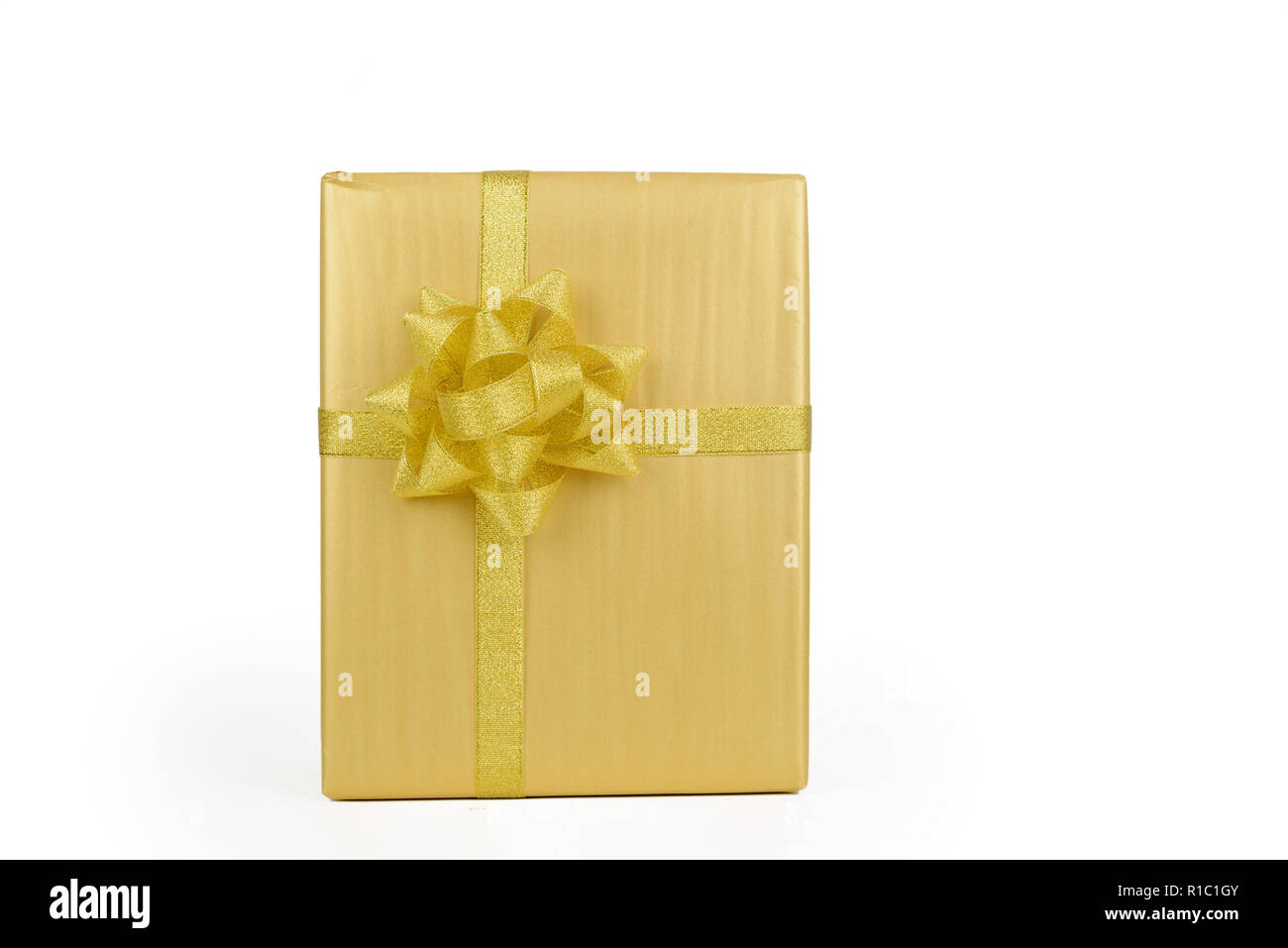 Golden gift box wrapped Cut Out Stock Images & Pictures - Alamy