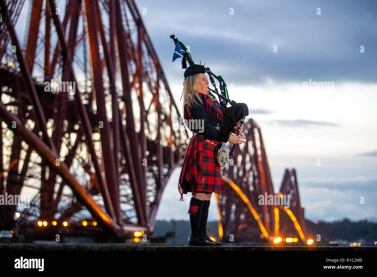Piper Louise Marshall, wearing a special commemorative red tartan ...
