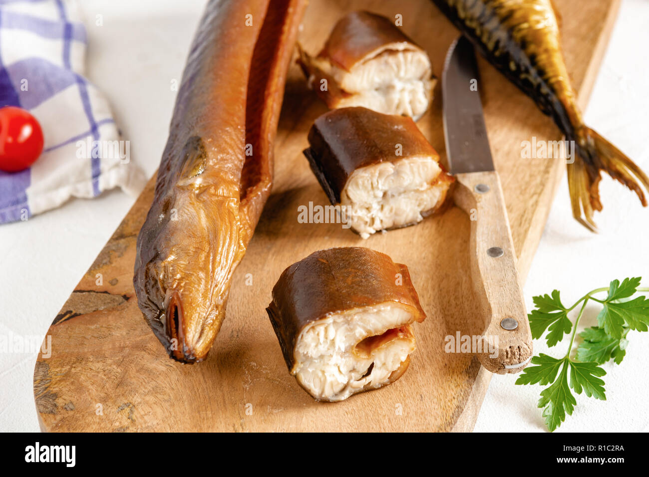 Smoked eel ready to eat. Delicious freshly made seafood Stock Photo - Alamy