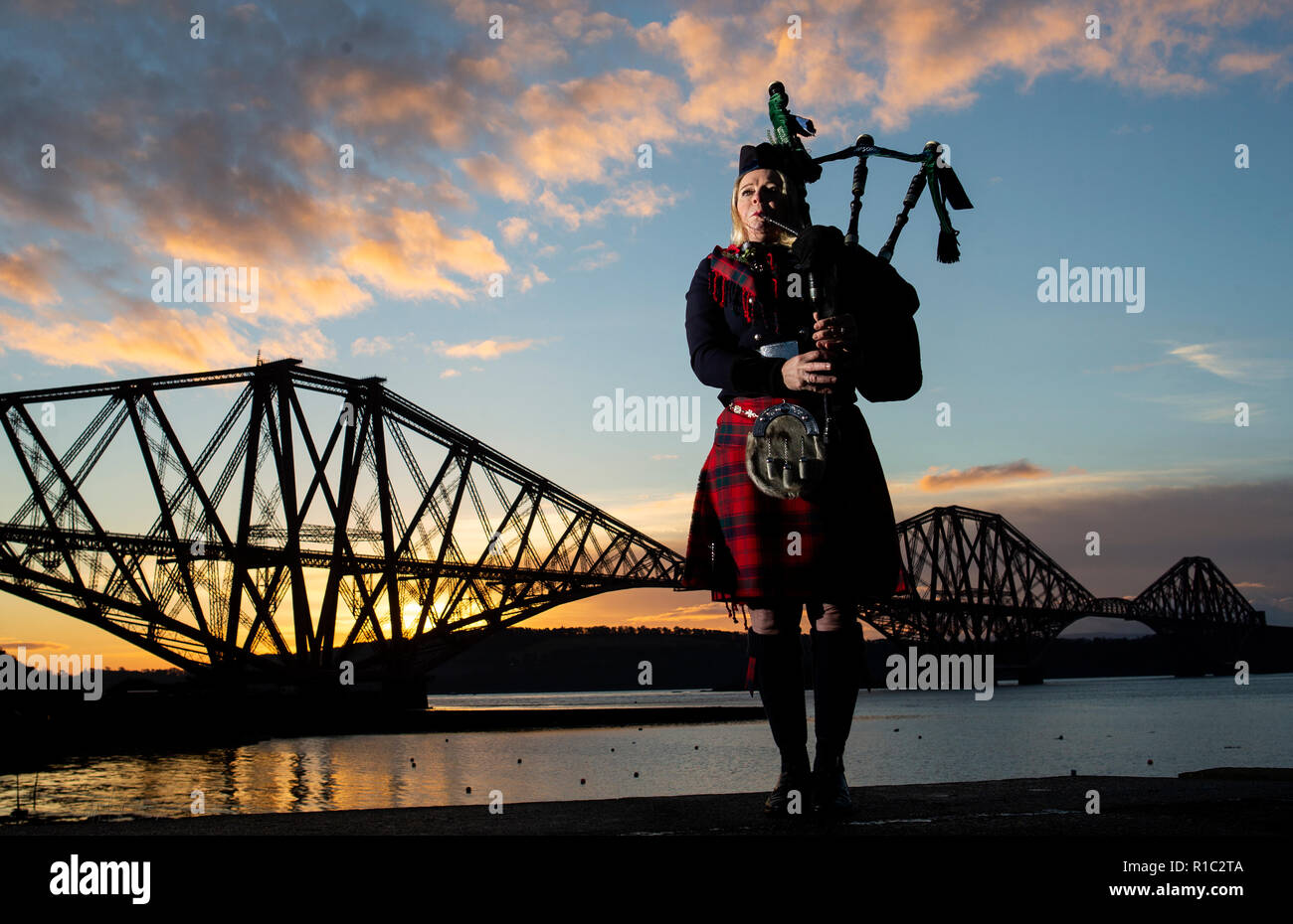 Piper Louise Marshall, wearing a special commemorative red tartan ...