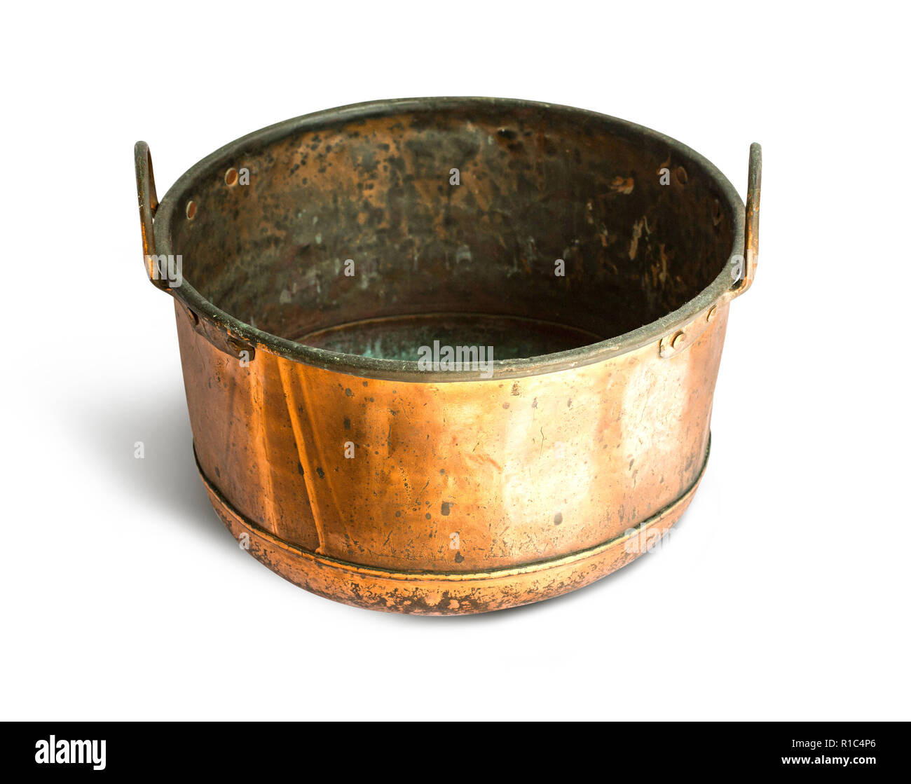 A big copper cauldron isolated on white. Clipping path included Stock ...