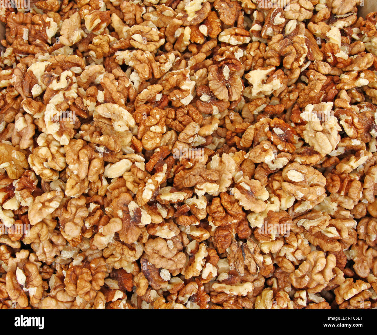 Full frame of peeled raw organic walnuts. Walnut background texture ...