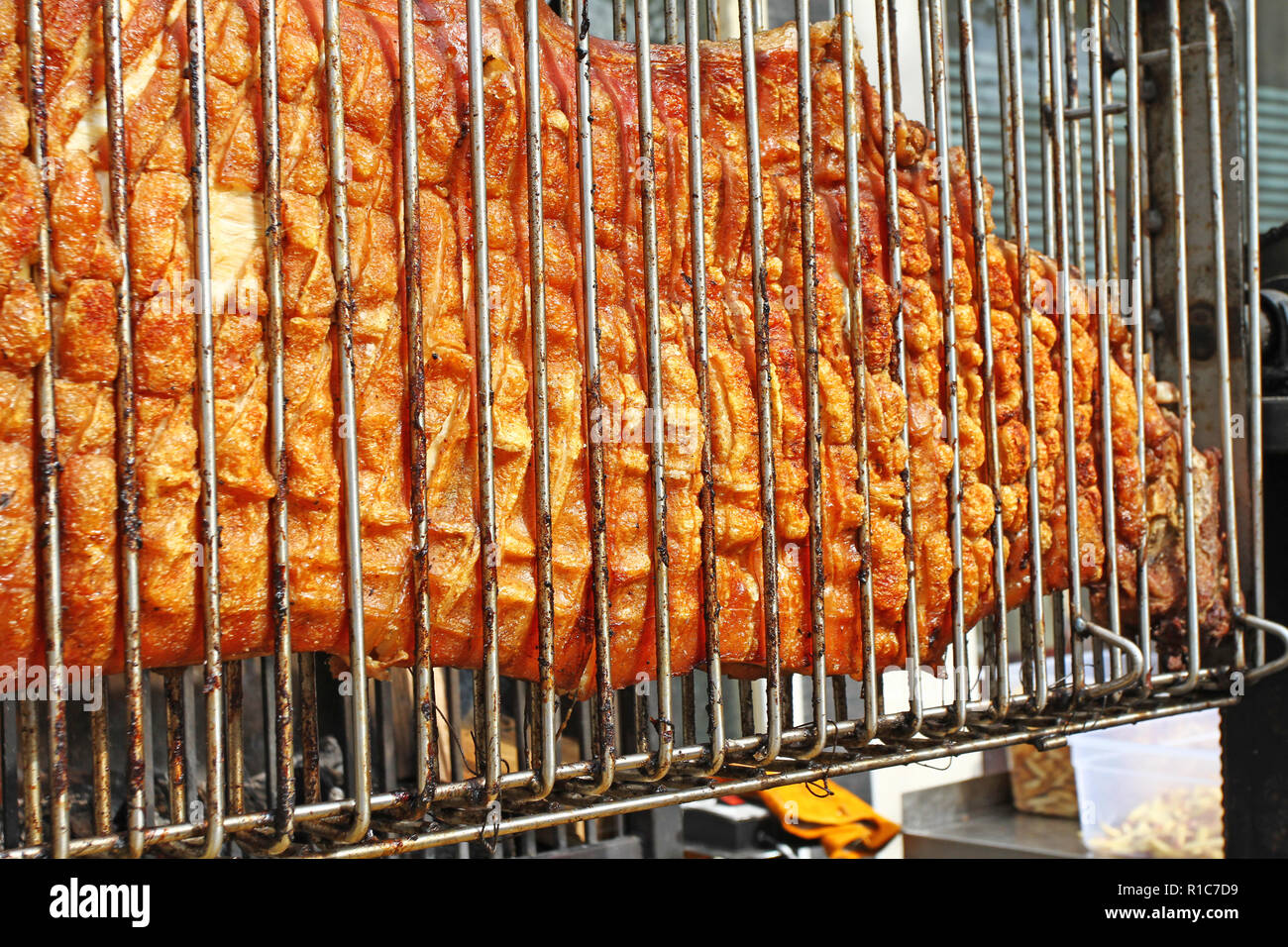 Whole pig roasted on a big grill. Kind of Cheverme, whole animal ...