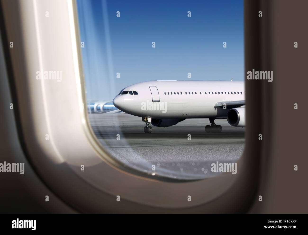 view of plane on runway through window, airport Stock Photo - Alamy
