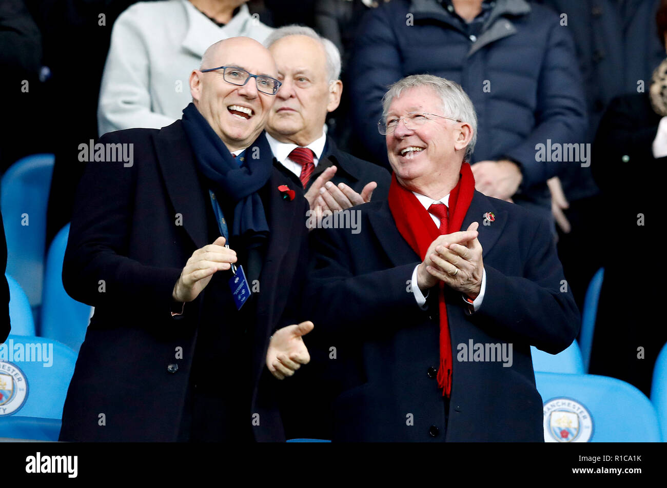 Sir Alex Ferguson (right) in the stands during the Premier League match ...