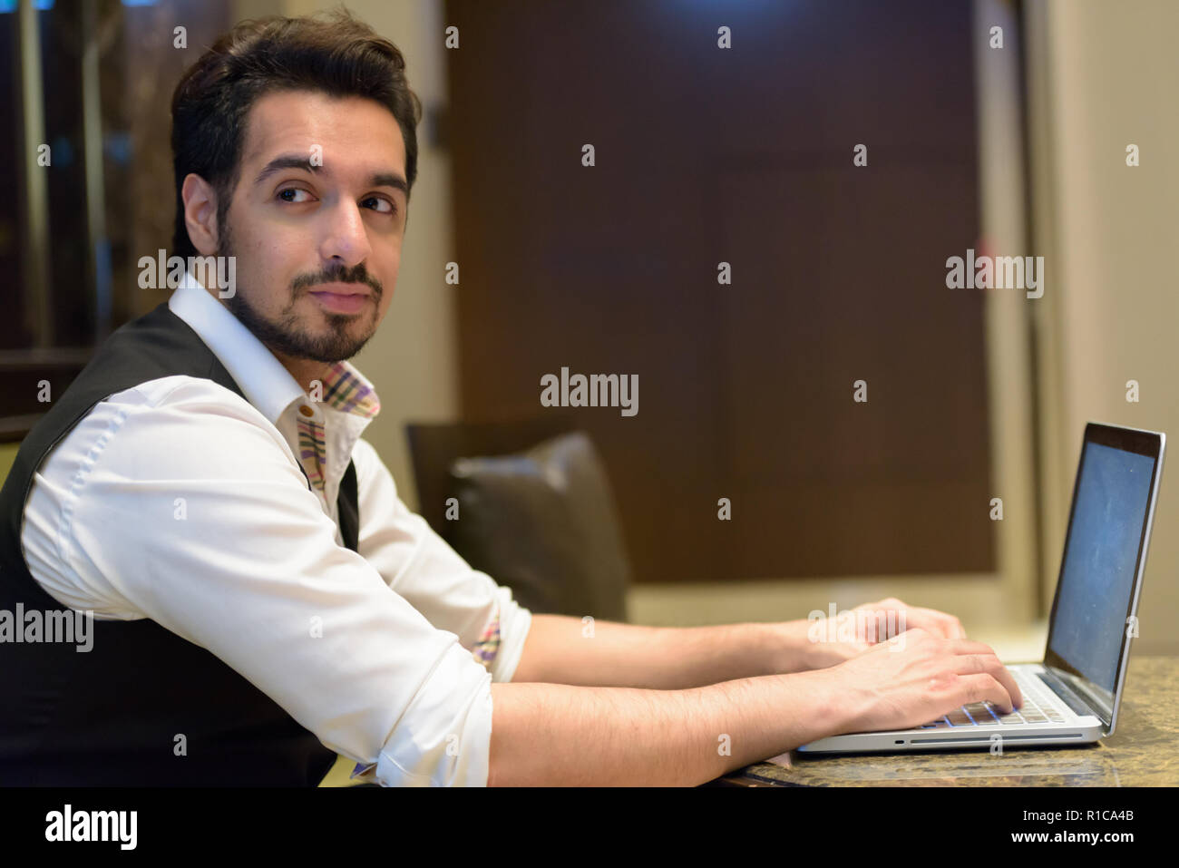Indian man using laptop hi-res stock photography and images - Alamy