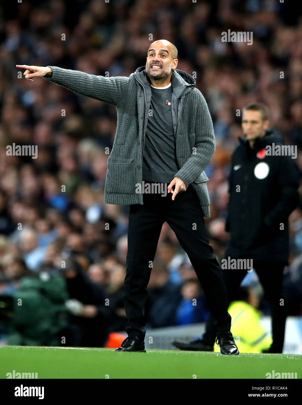 Manchester City manager Pep Guardiola gestures on the touchline during ...