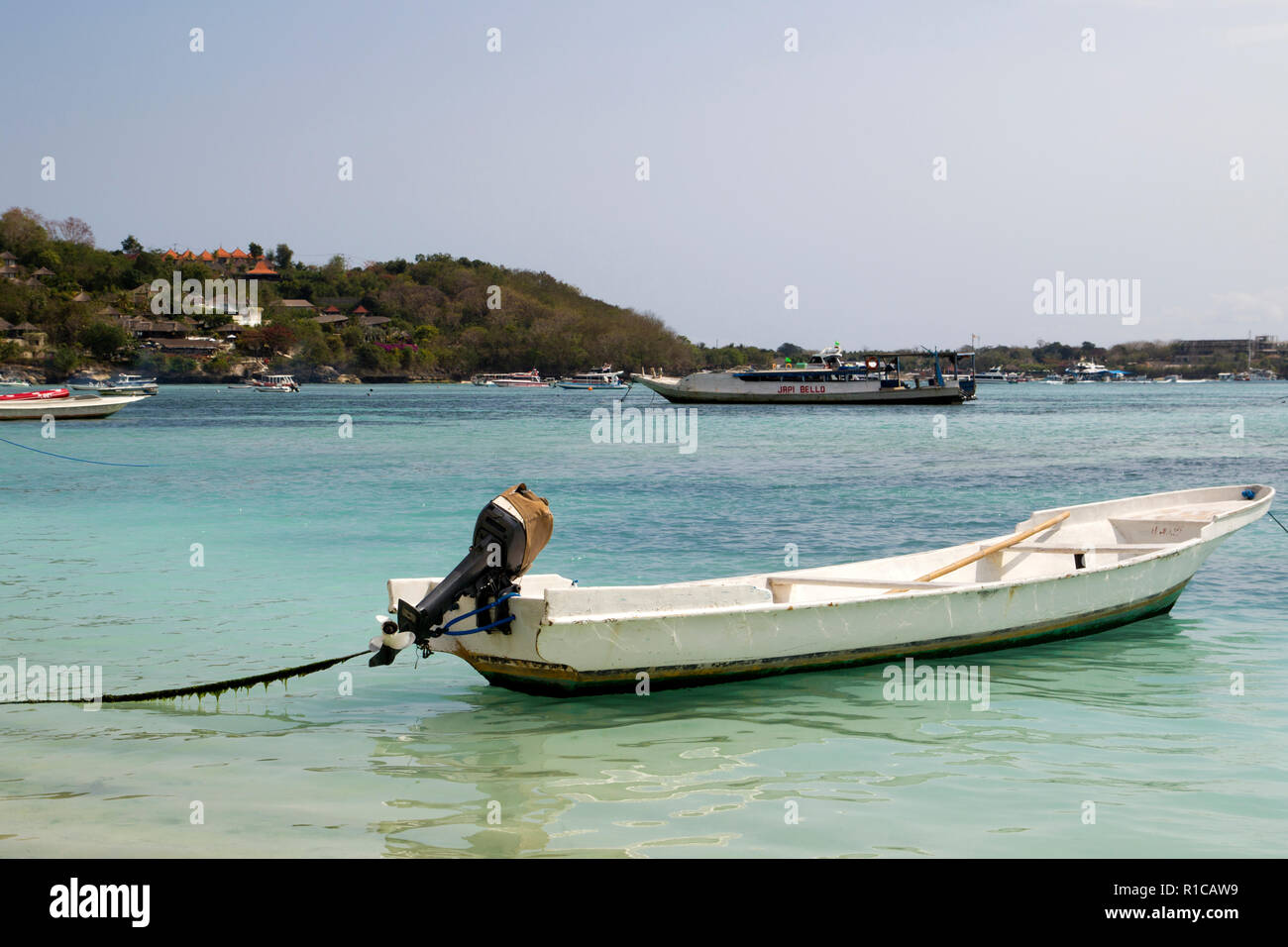White motorboat in the port of Lembongan, to Bali, Indonesia. With a ...