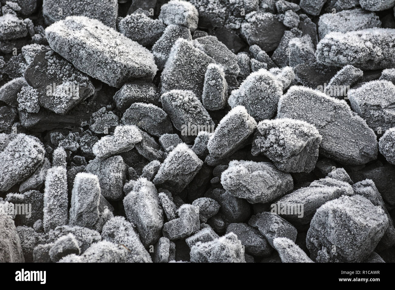 A pile of coal covered with thick crystals of frost Stock Photo - Alamy