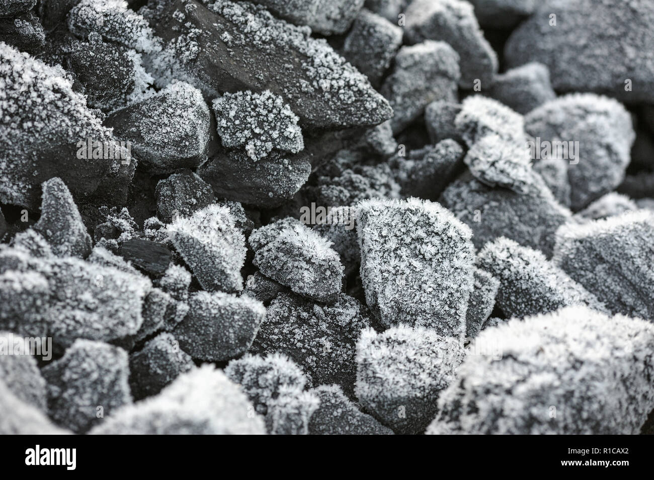 A pile of coal covered with thick crystals of frost Stock Photo - Alamy