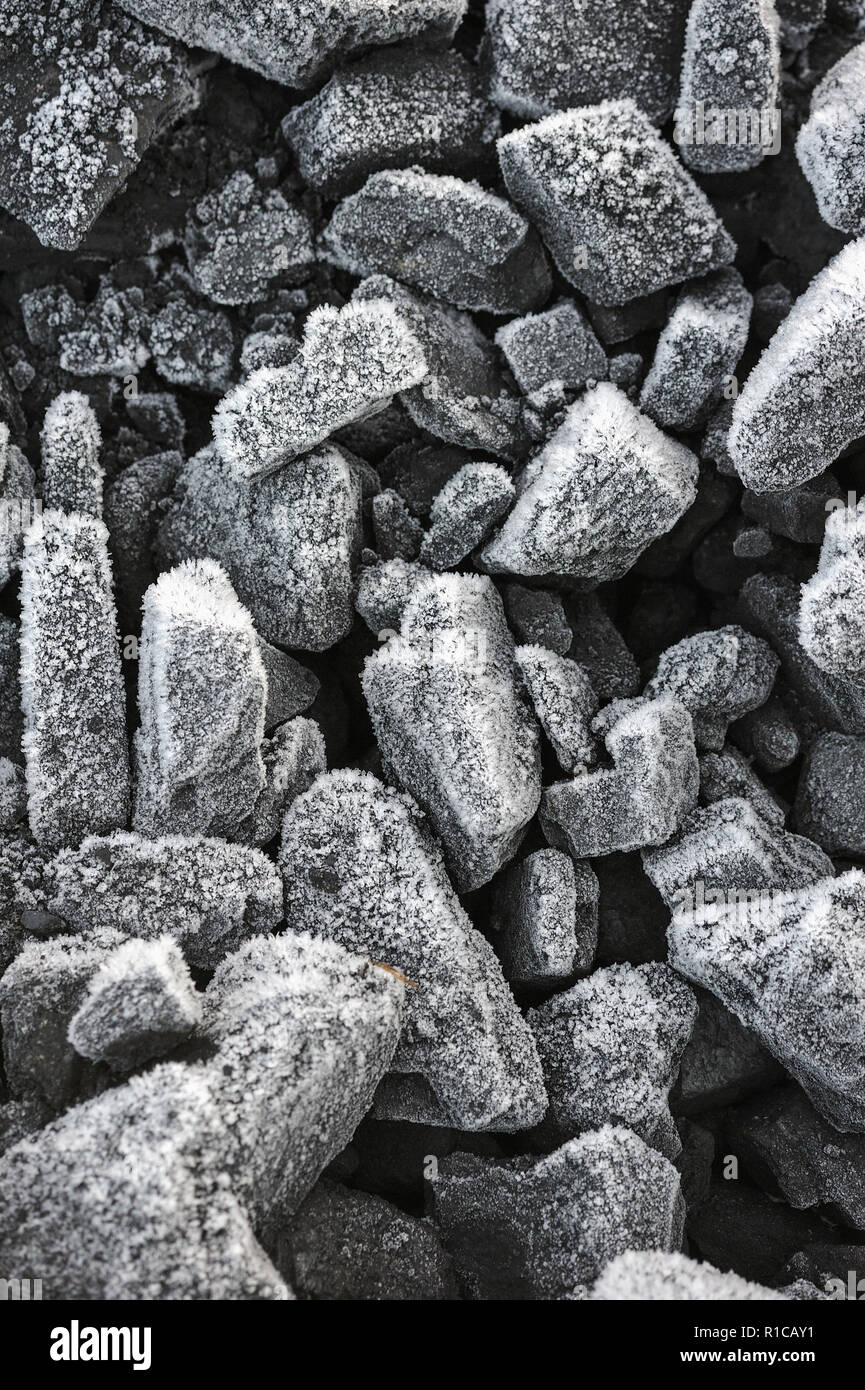A pile of coal covered with thick crystals of frost Stock Photo - Alamy