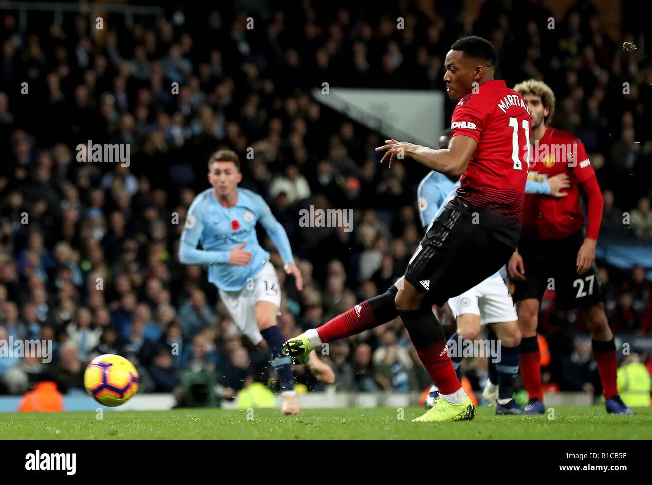 Manchester United's Anthony Martial scores his side's first goal of the ...