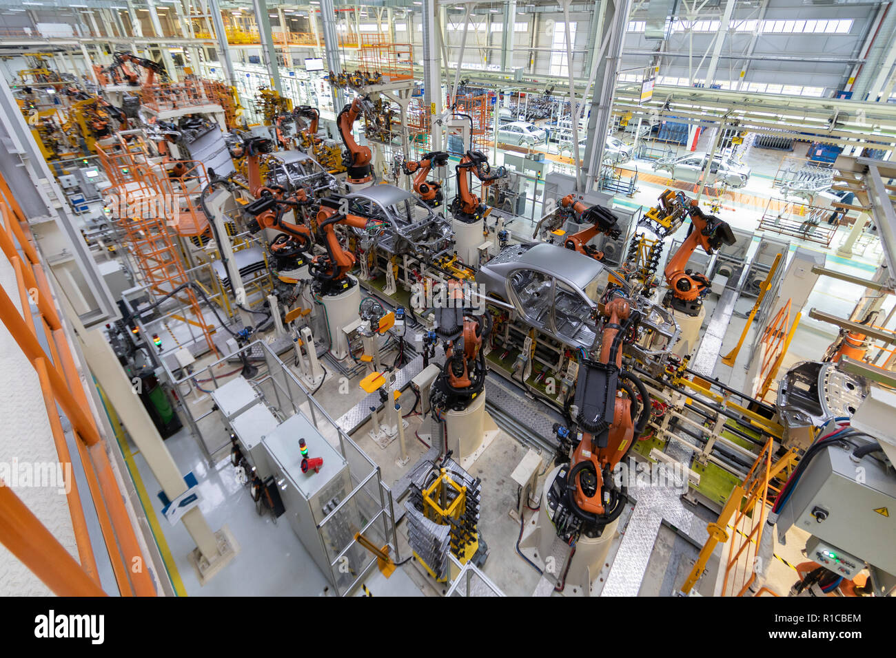 body of car on conveyor top view. Modern Assembly of cars at the plant ...