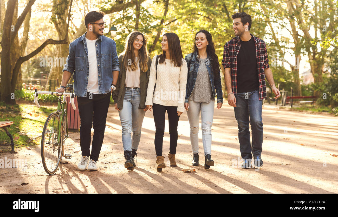 Group students walking together hi-res stock photography and images - Alamy