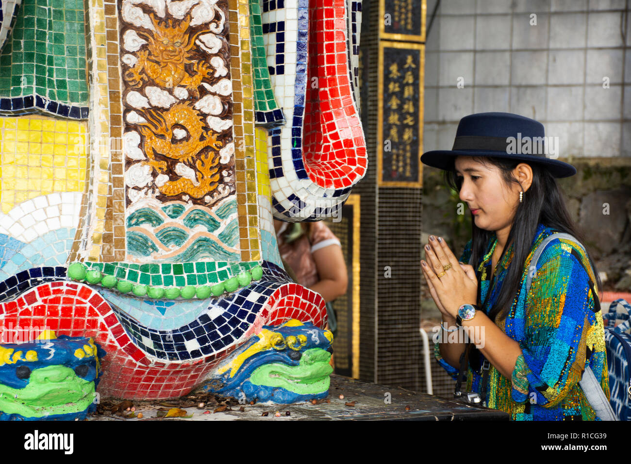 Traveler thai woman visit and respect praying Dragon god of the sea ...