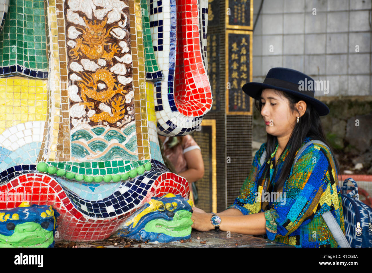 Traveler thai woman visit and respect praying Dragon god of the sea ...