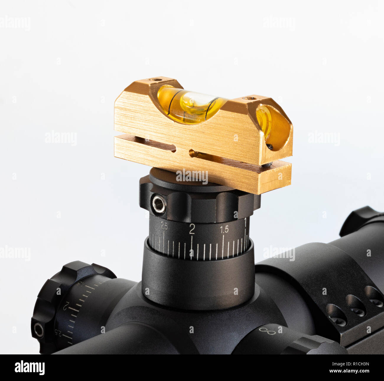 Turret on a rifle scope with a level during installation in bases and ...