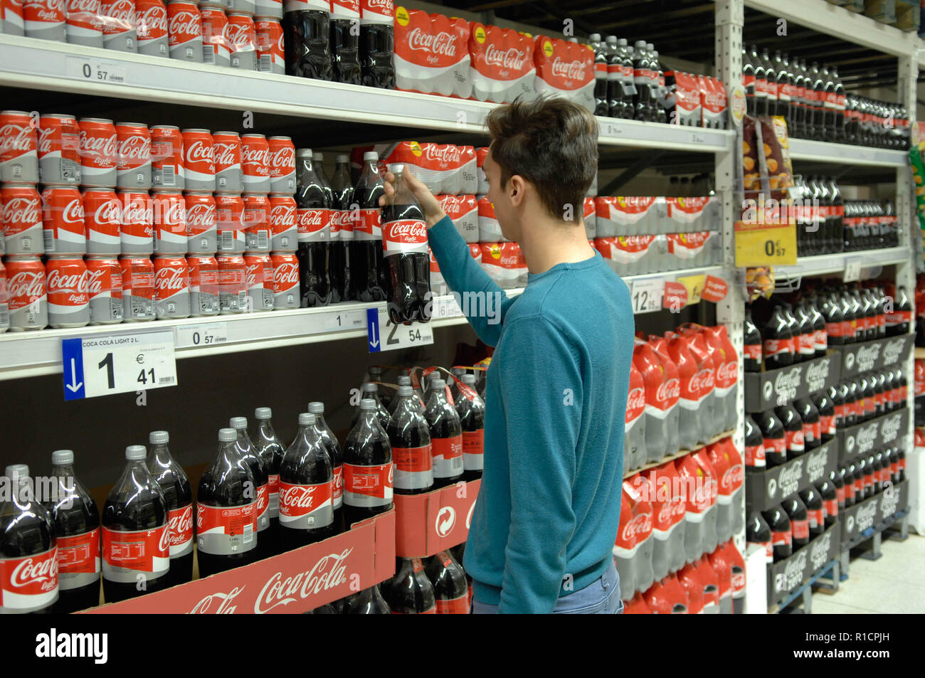 a customer picking up a coke Stock Photo - Alamy