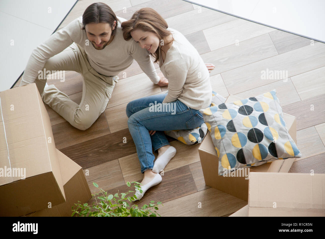 Person surrounded by boxes hi-res stock photography and images - Alamy