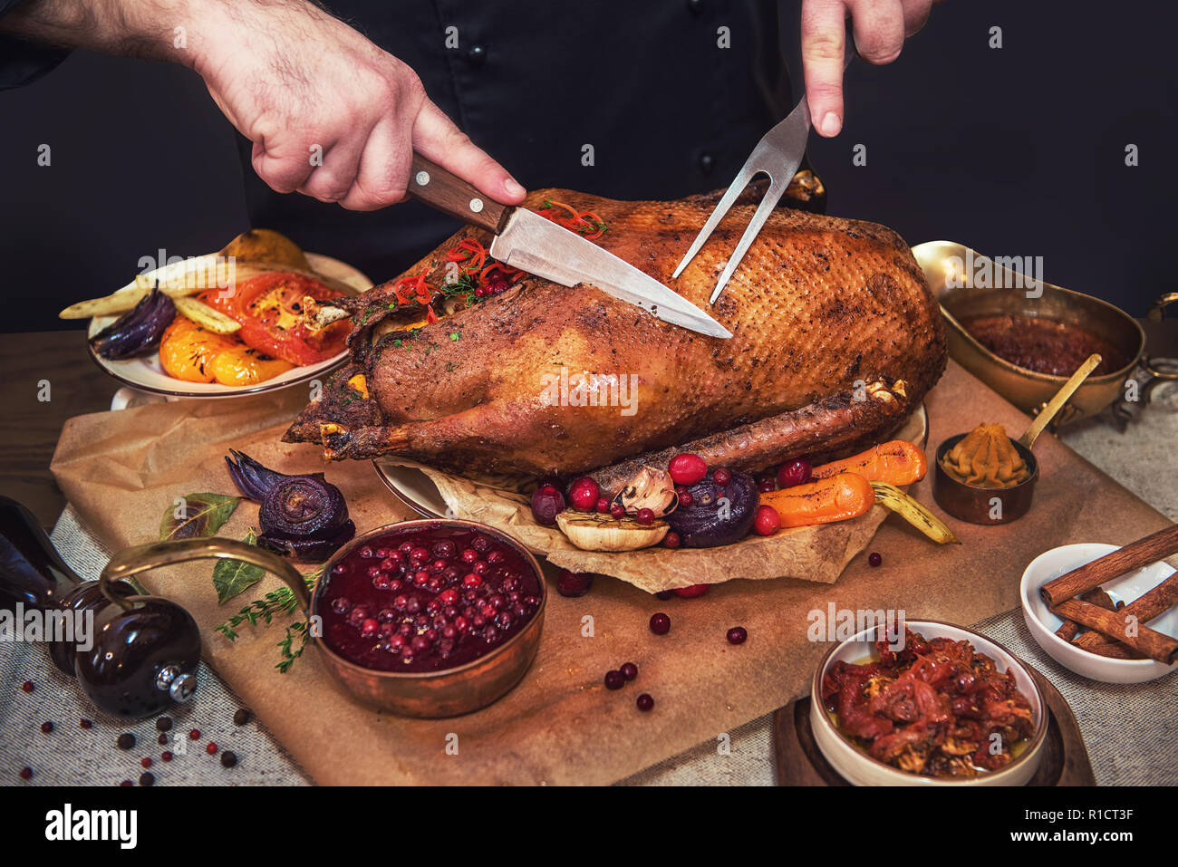 Roasted goose with herbs berries and vegetables Stock Photo - Alamy