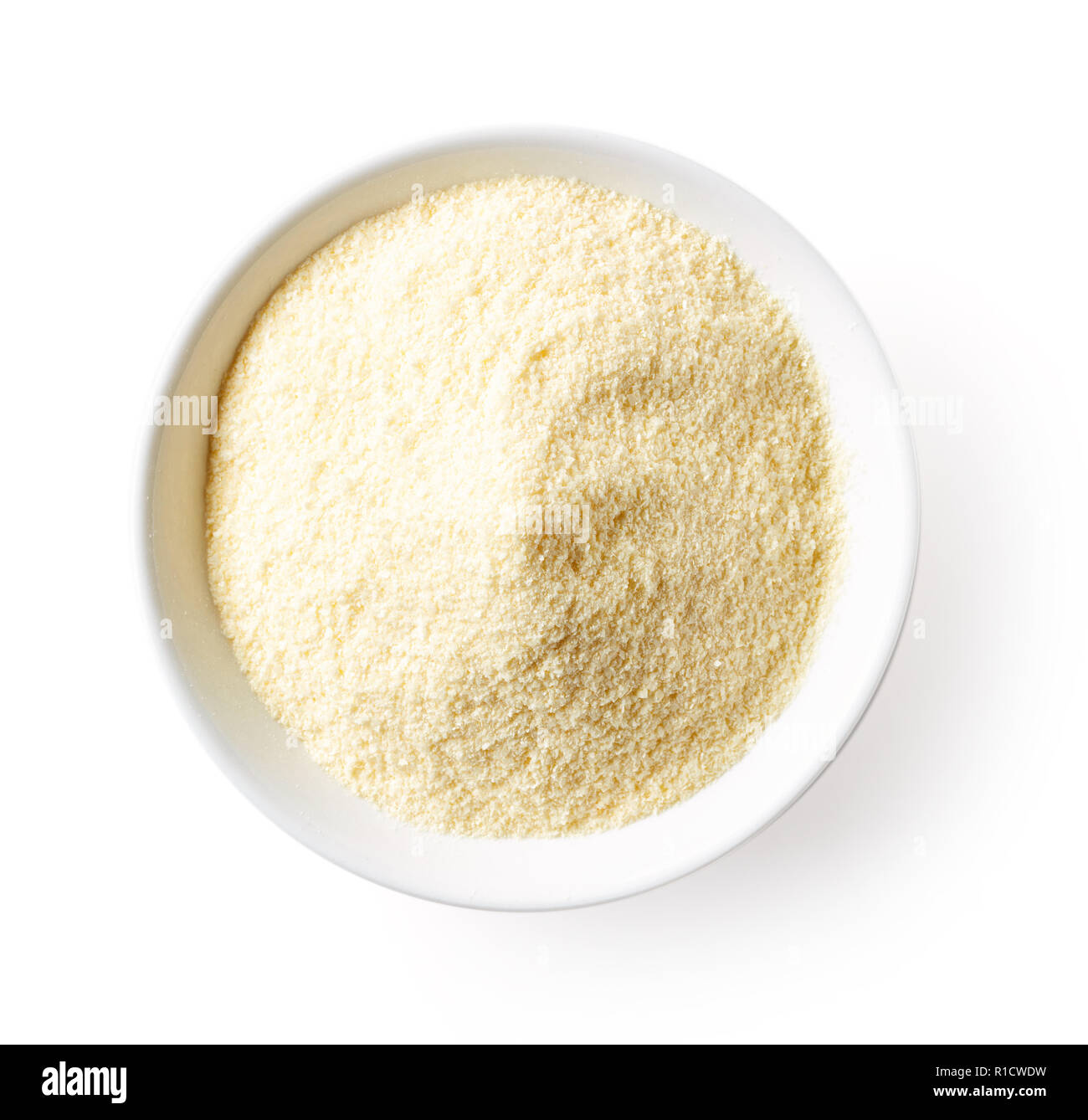 Bowl of corn porridge powder for babies isolated on white background ...