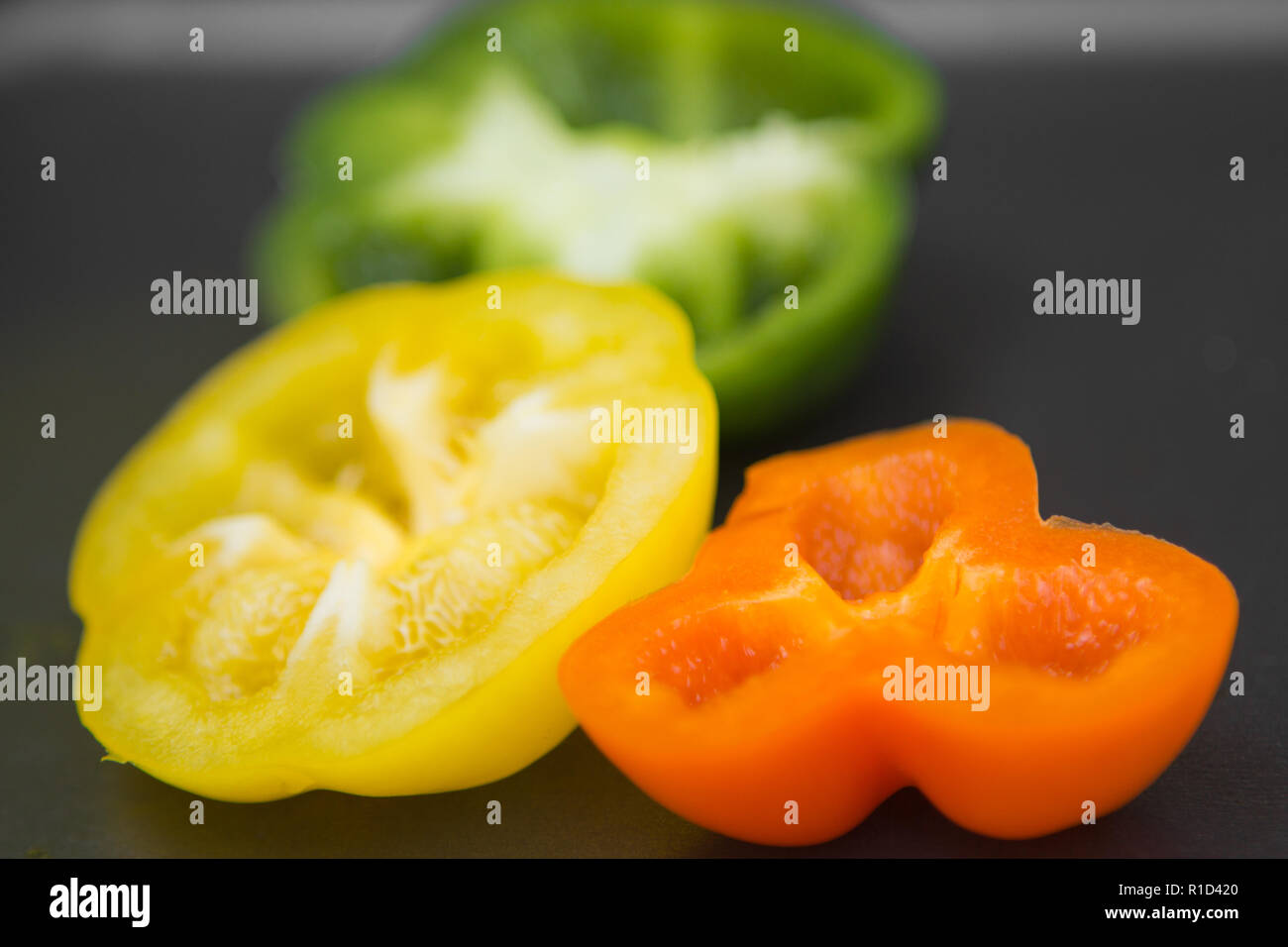 sliced peppers isolated Stock Photo - Alamy