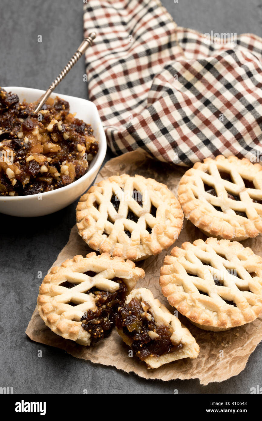 Mince pie group on black stone background Stock Photo - Alamy
