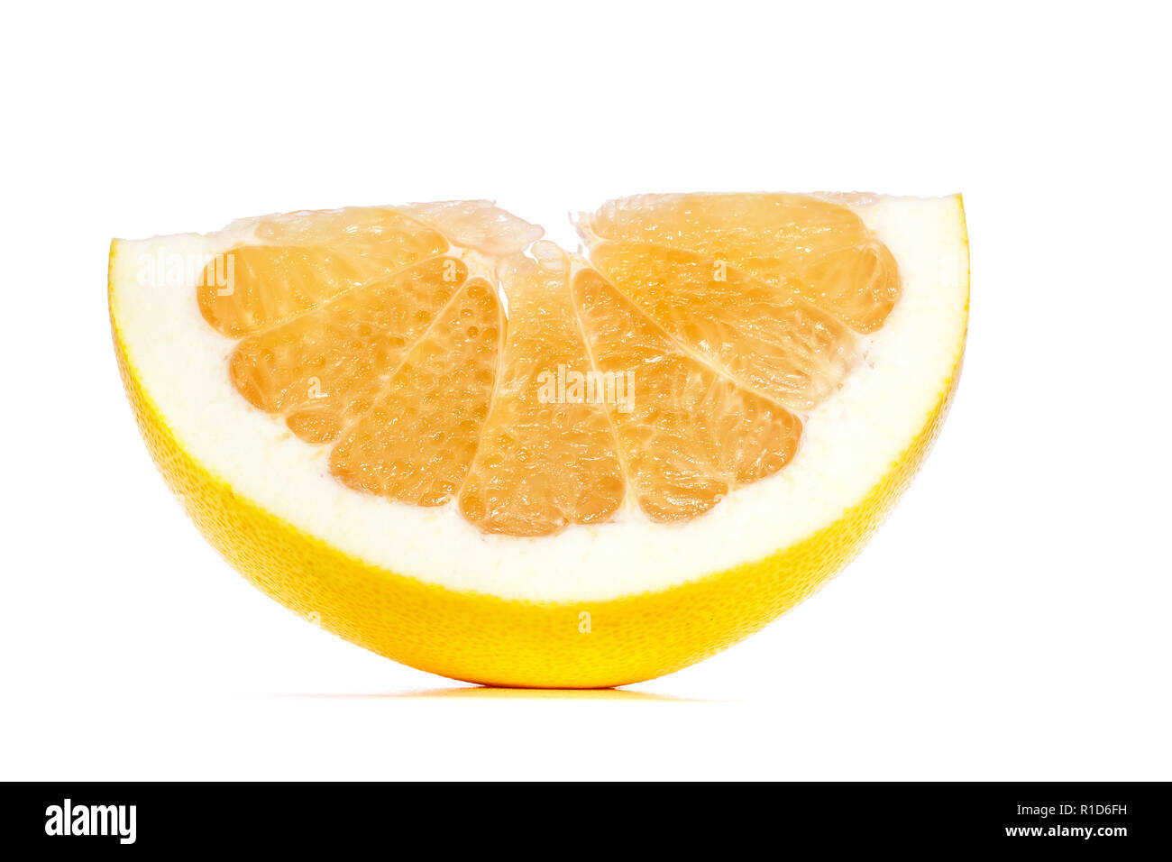 Pomelo fruit slice closeup isolated on white background Stock Photo - Alamy