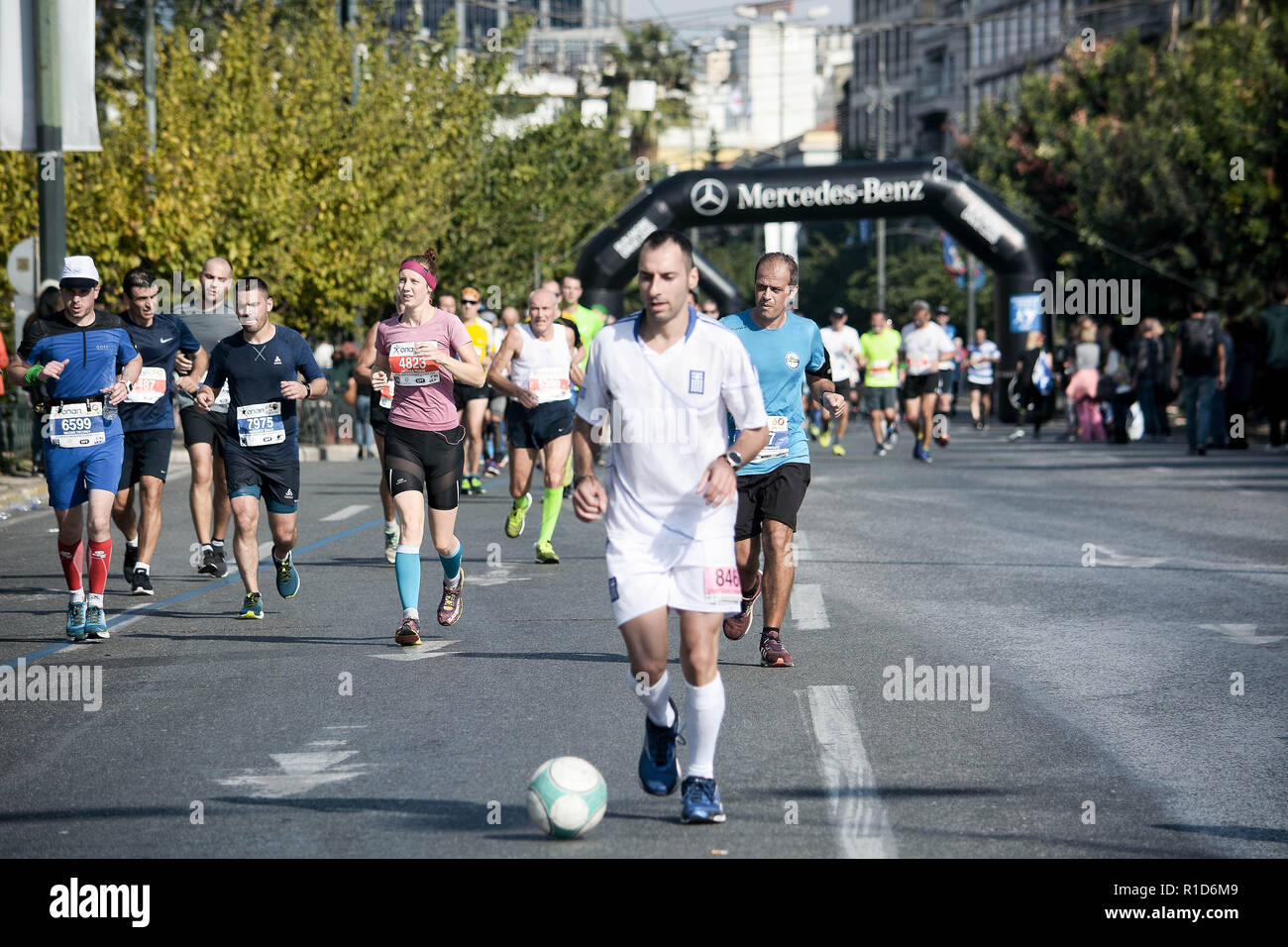Marathon athletes are seen running during the Athens Marathon, The ...