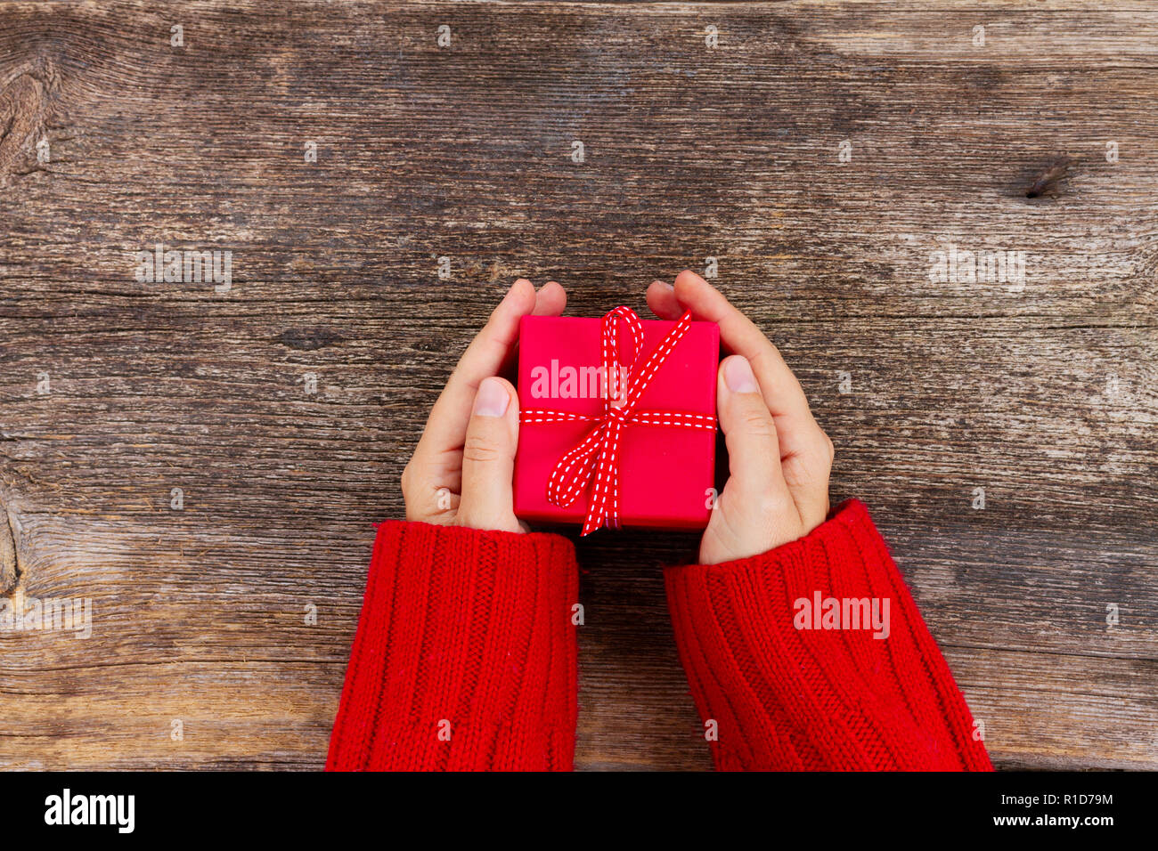 Christmas gift giving Stock Photo - Alamy