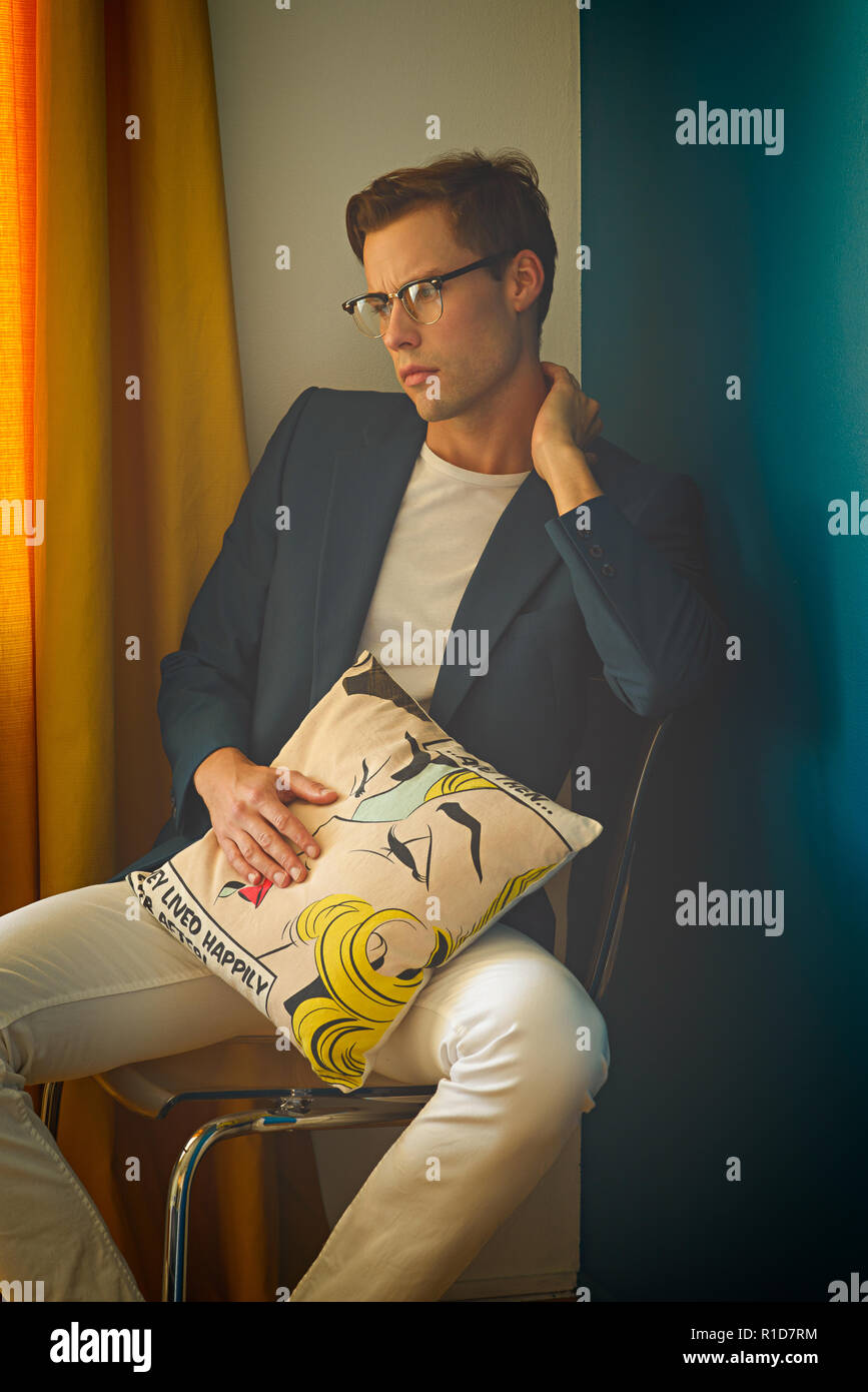 Male model sitting chair hi-res stock photography and images - Alamy