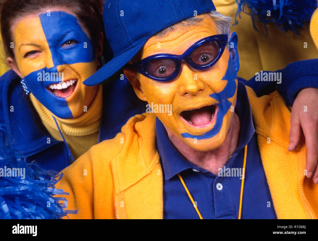Enthusiastic Sports Fans with Painted Faces at a Game, USA Stock Photo ...