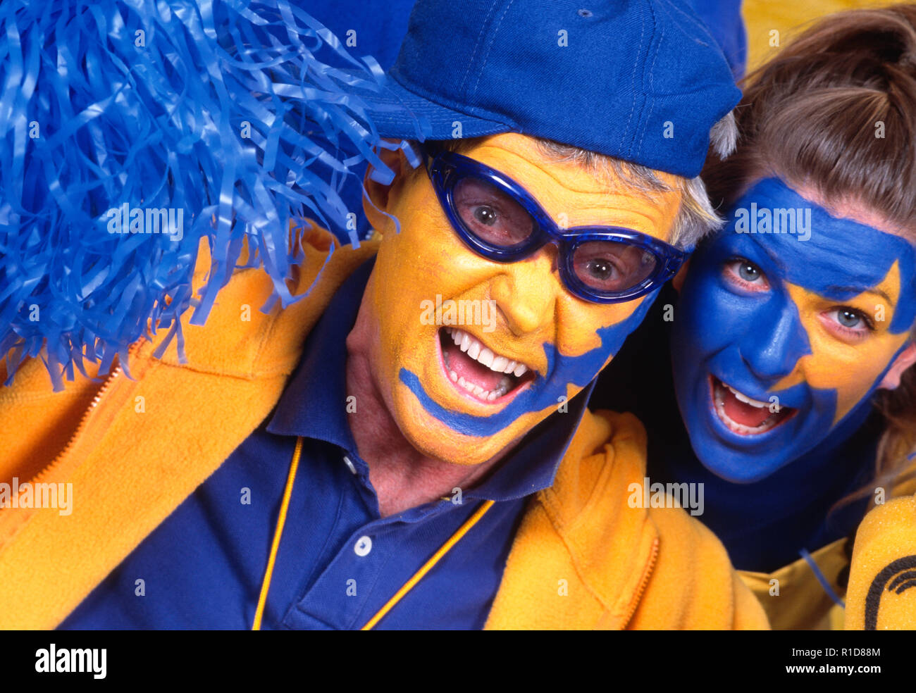 Enthusiastic Sports Fans with Painted Faces at a Game, USA Stock Photo ...
