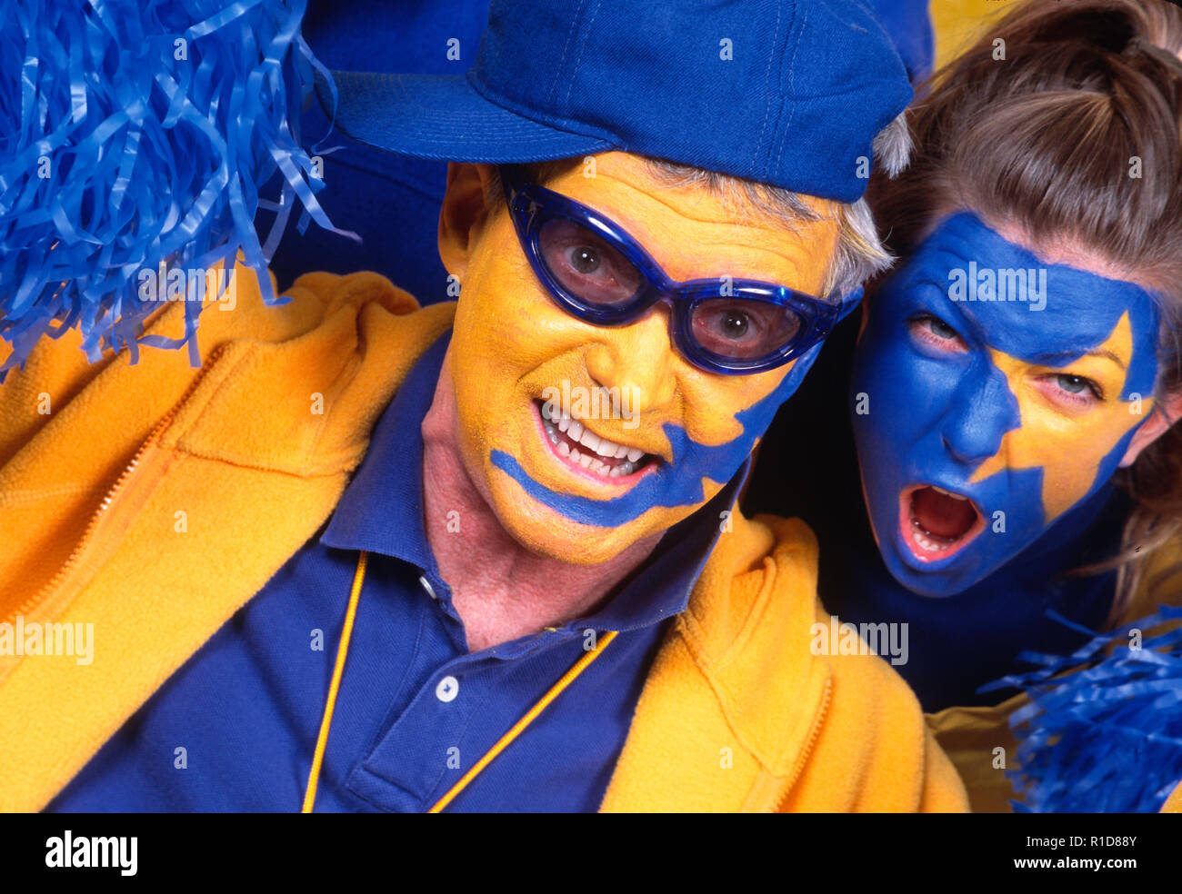 Enthusiastic Sports Fans with Painted Faces at a Game, USA Stock Photo ...