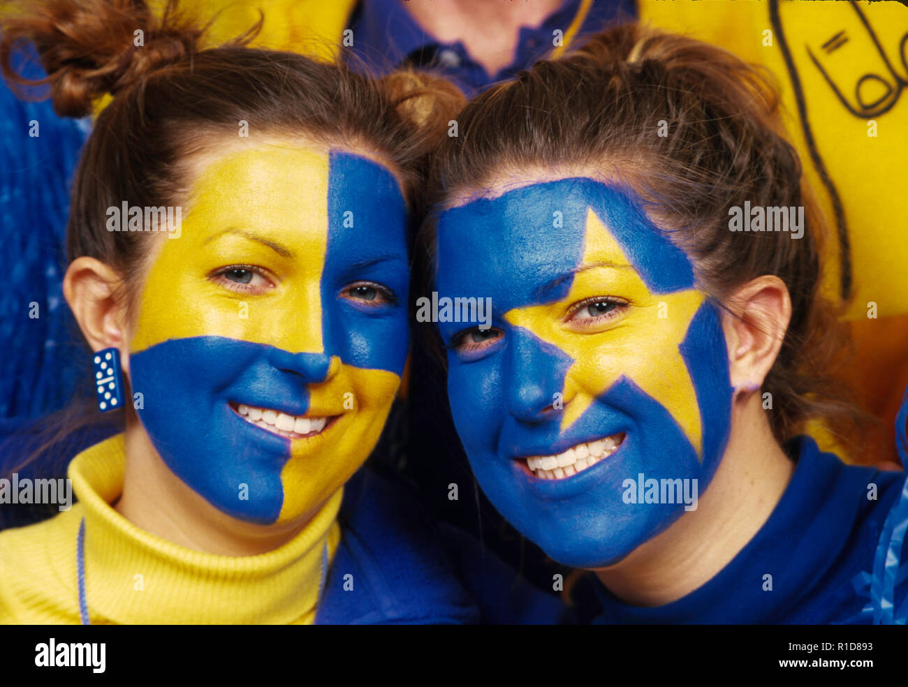Enthusiastic Sports Fans with Painted Faces at a Game, USA Stock Photo ...