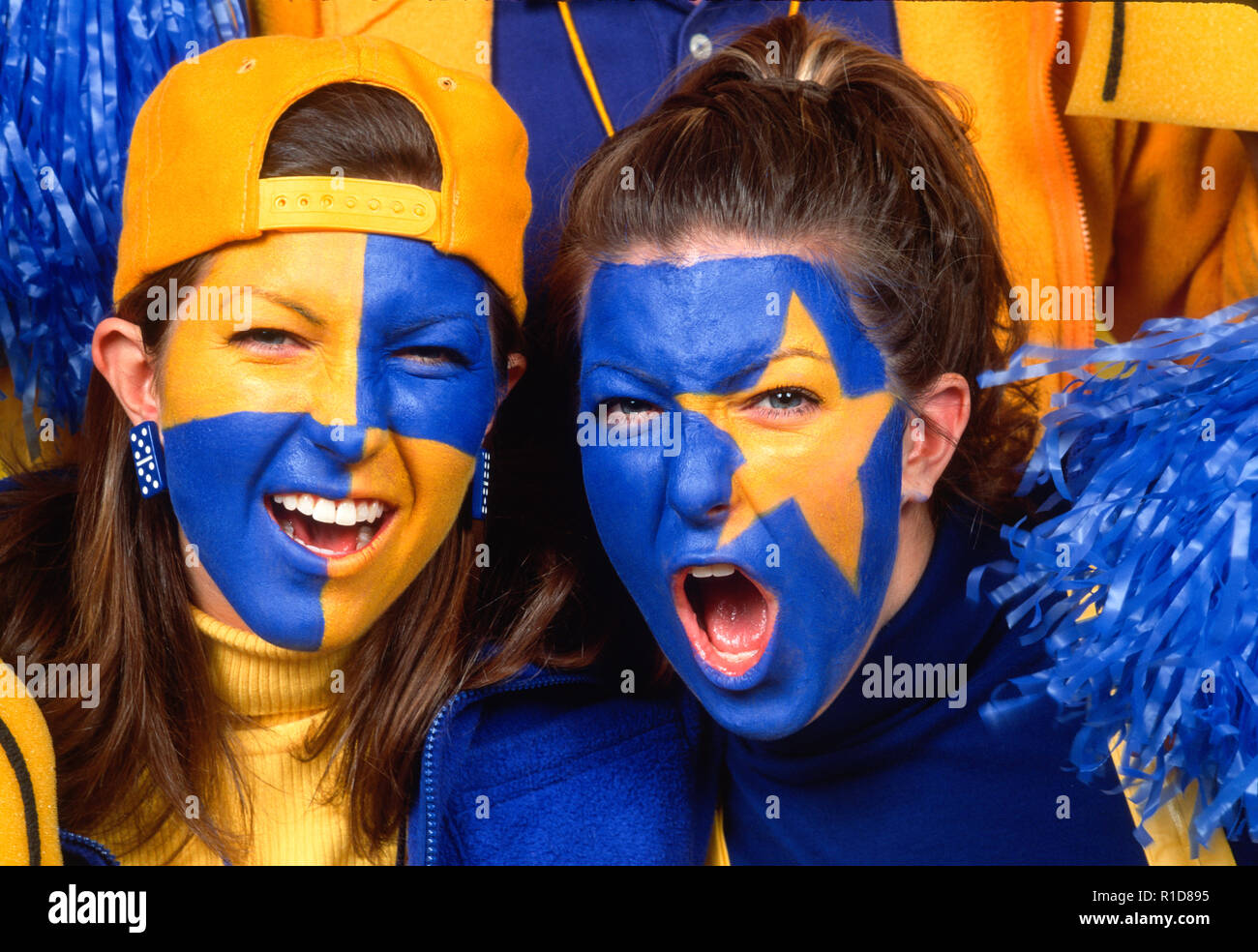Enthusiastic Sports Fans with Painted Faces at a Game, USA Stock Photo ...