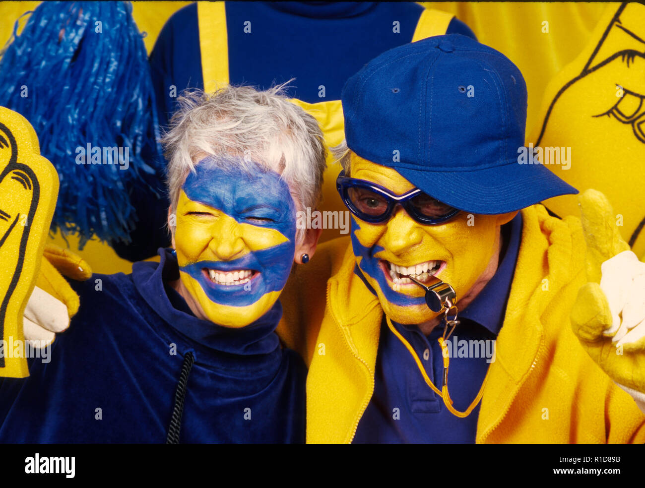 Enthusiastic Sports Fans with Painted Faces at a Game, USA Stock Photo ...