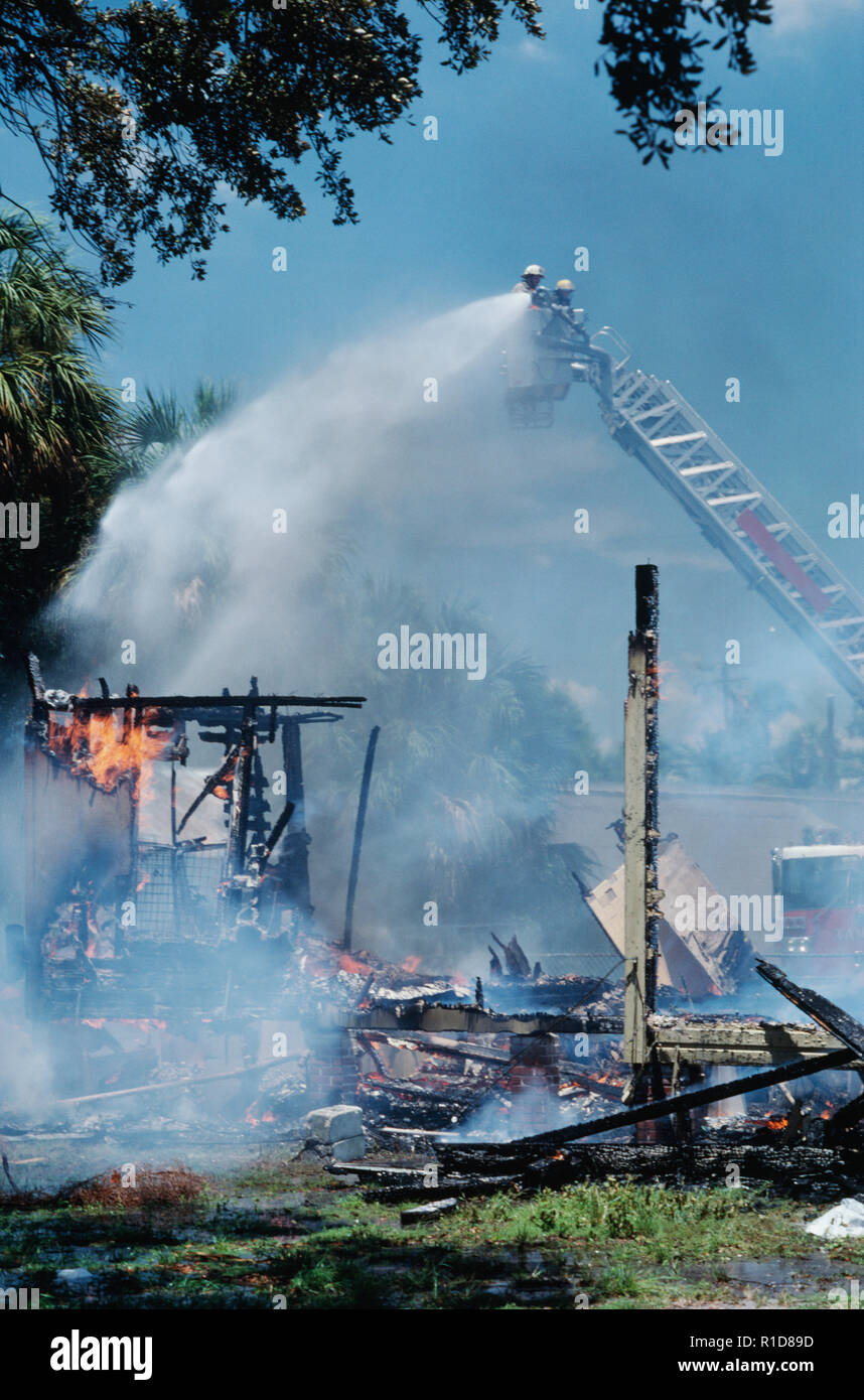 Extinguishes extinguishing extinguish hi-res stock photography and ...