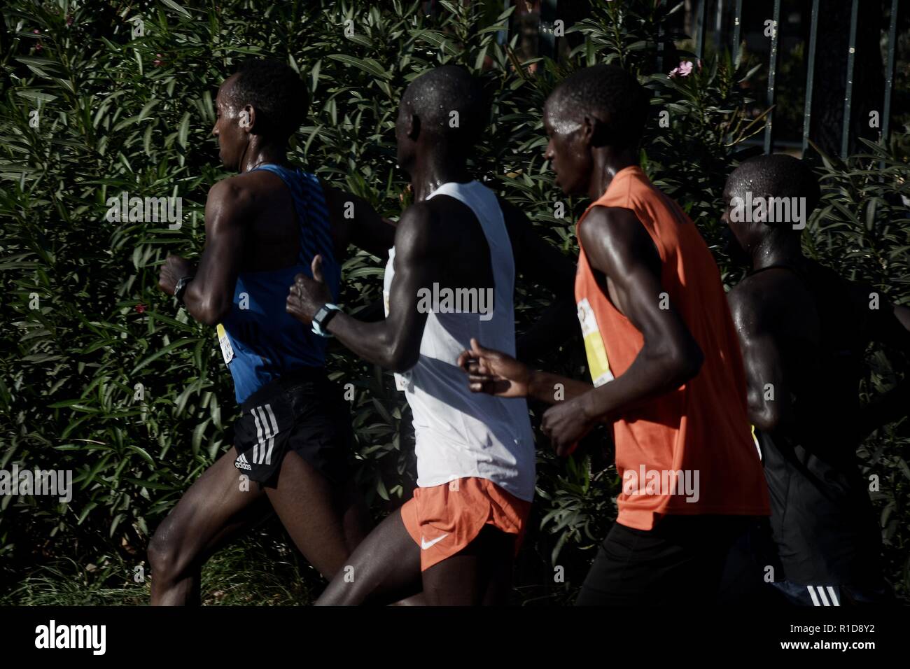 Group athletes running greece hi-res stock photography and images - Alamy