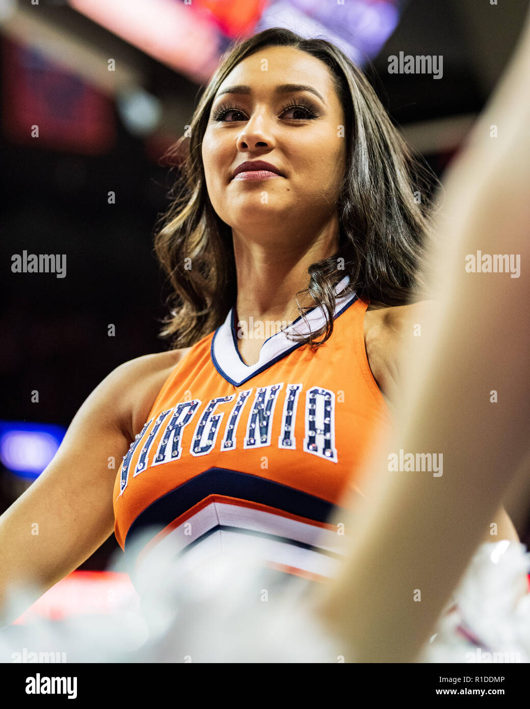A Virginia Cavaliers cheerleader during the NCAA Basketball game ...