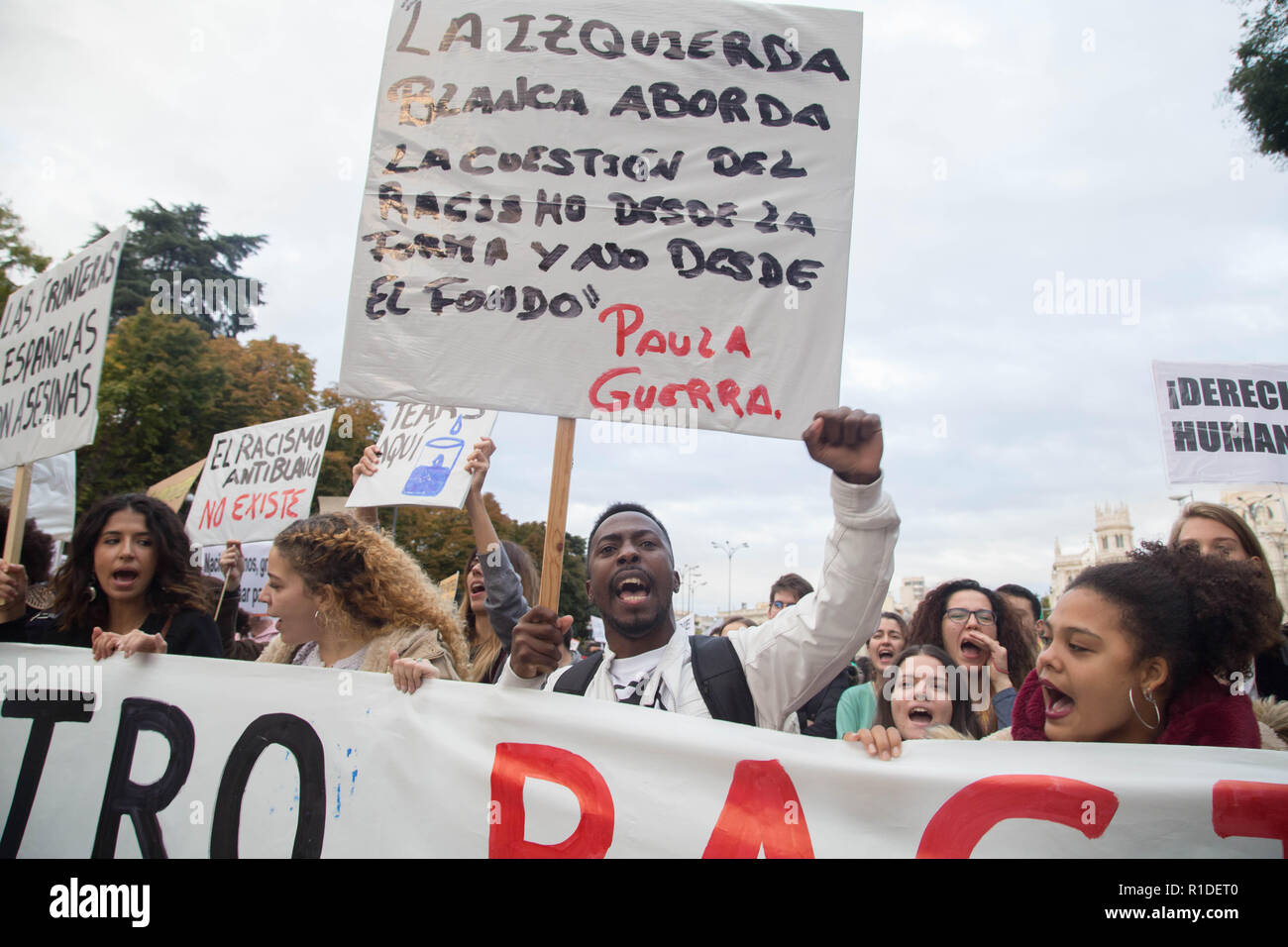 Madrid, Spain. 11th Nov, 2018. A protester seen holding a placard while ...