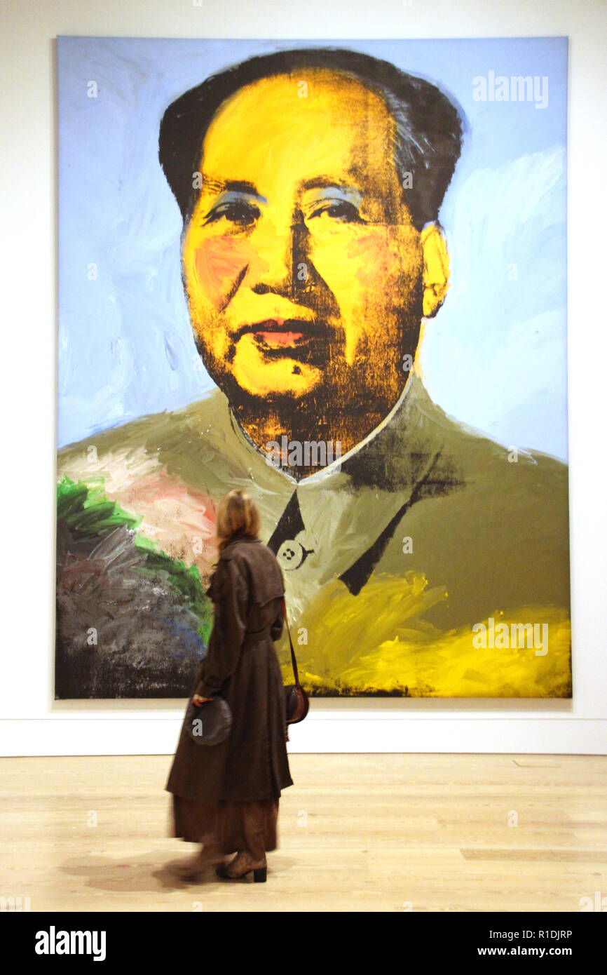 New York, USA. 06th Nov, 2018. A visitor stands in front of Andy Warhol's work "Mao" in the US ...