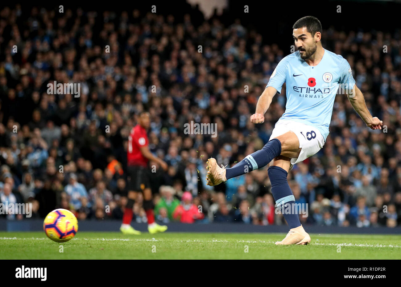 Manchester City's Ilkay Gundogan scores his side's third goal of the ...