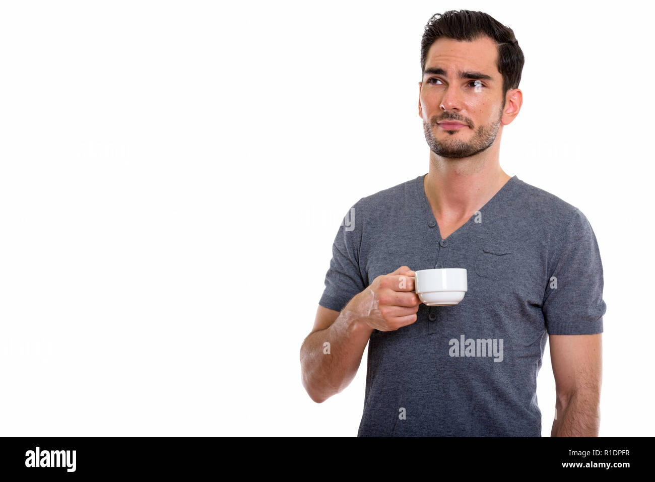 Man holding up shirt hi-res stock photography and images - Alamy